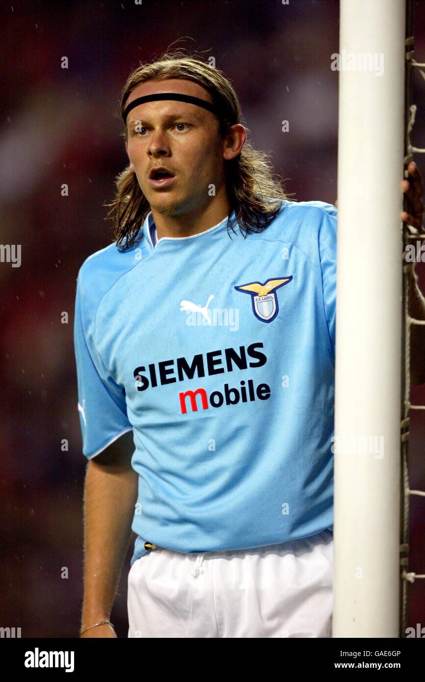 Lazios roberto baronio marks the front post on a corner hi-res stock ...