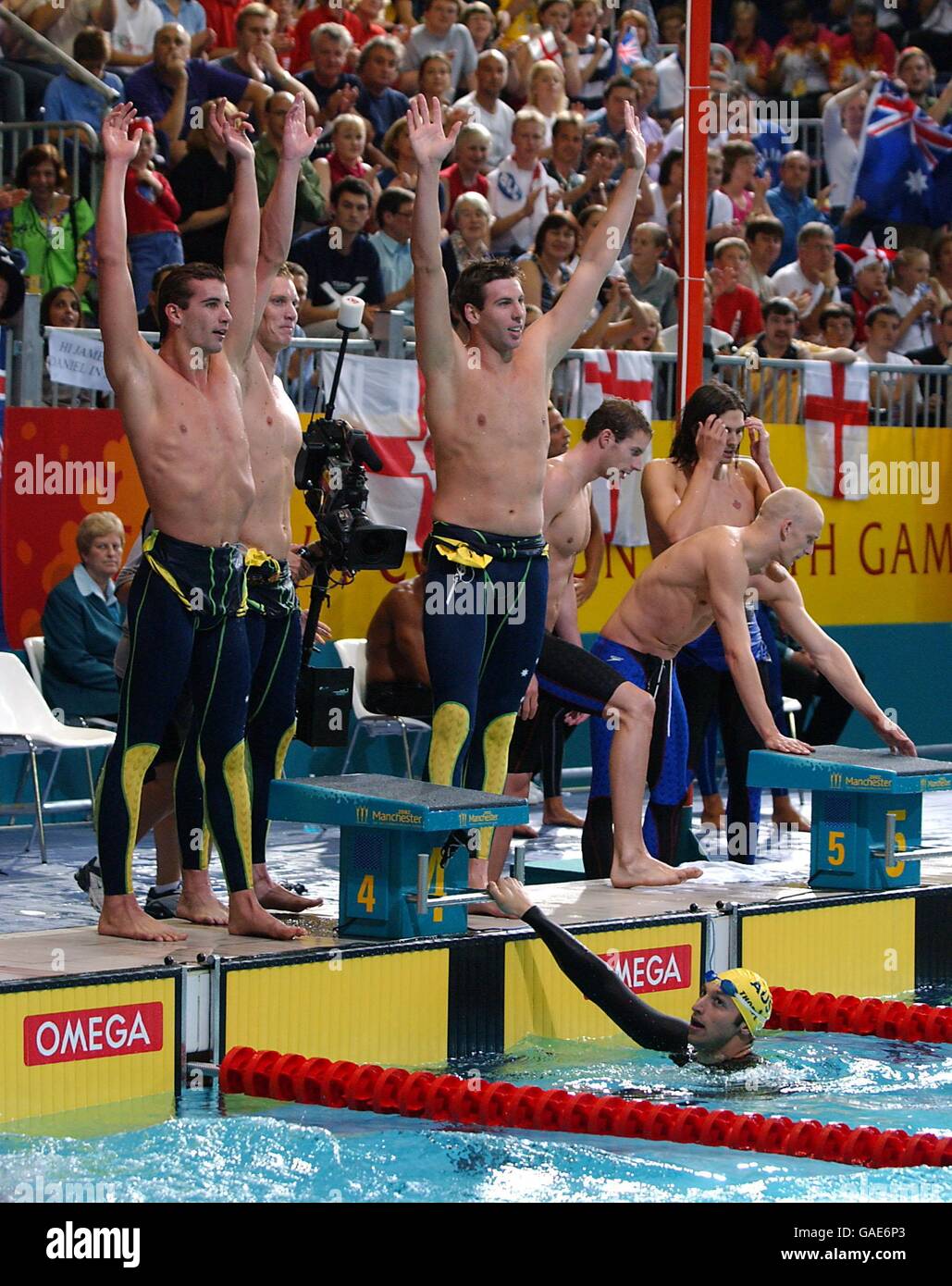 Australias 4x400m freestyle relay team celebrates their win hi-res ...
