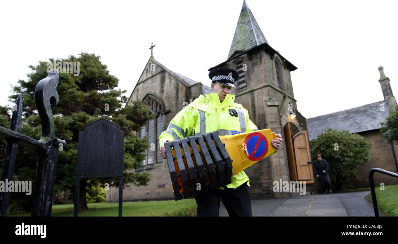 A policeman outside Redding Parish Church where the funeral of ...