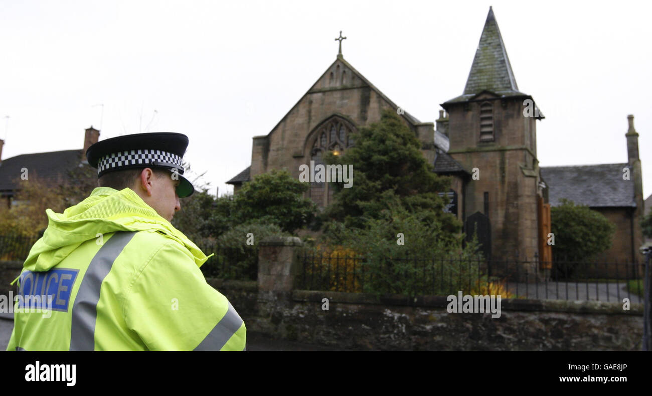 A policeman outside Redding Parish Church where the funeral of ...