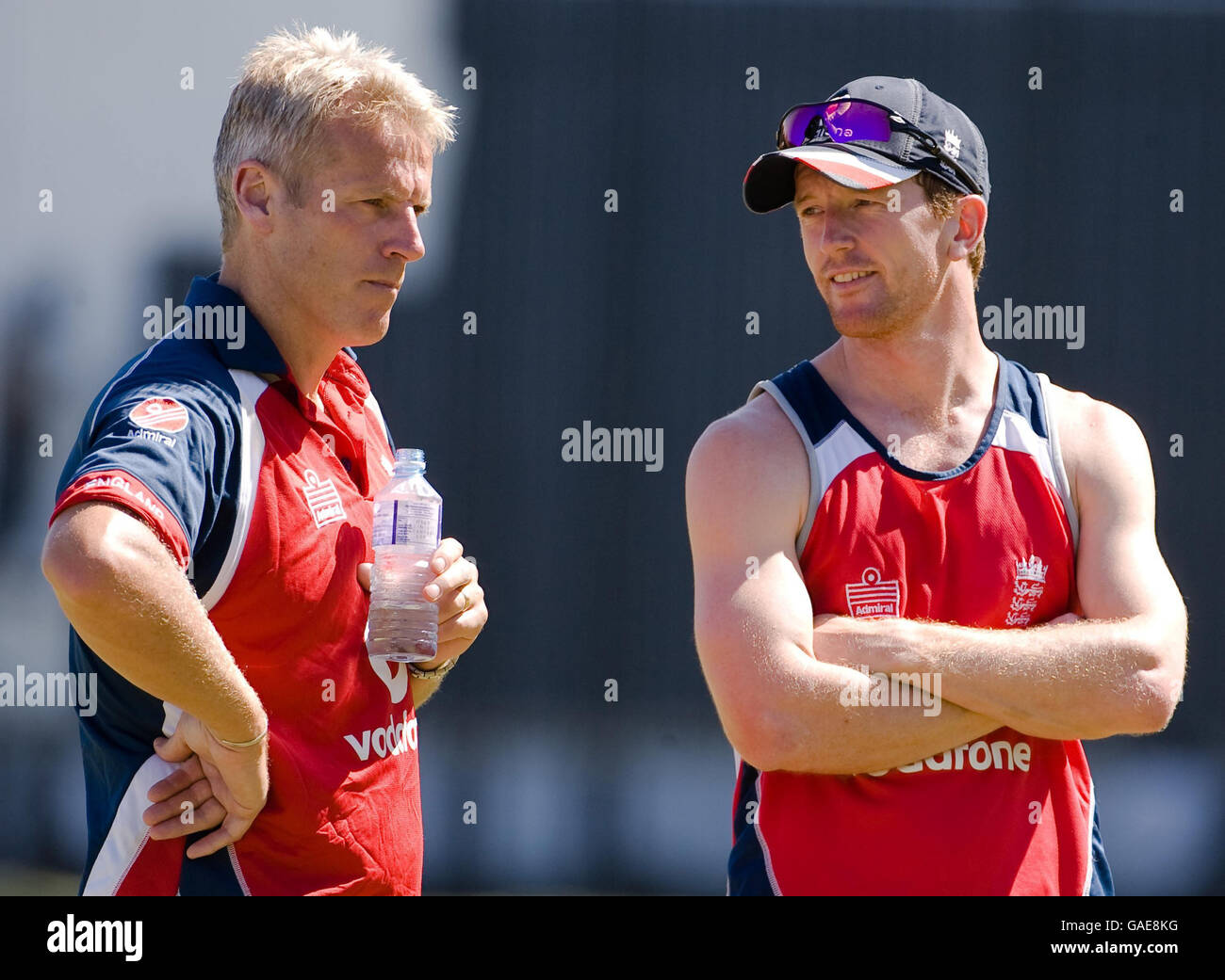 England's Paul Collingwood with coach Peter Moores (left) during a nets ...