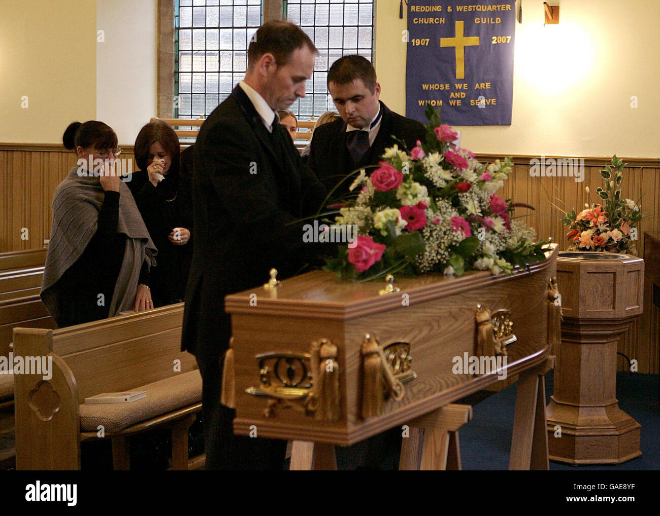Vicky Hamilton's coffin is placed at the alter inside Redding Parish ...