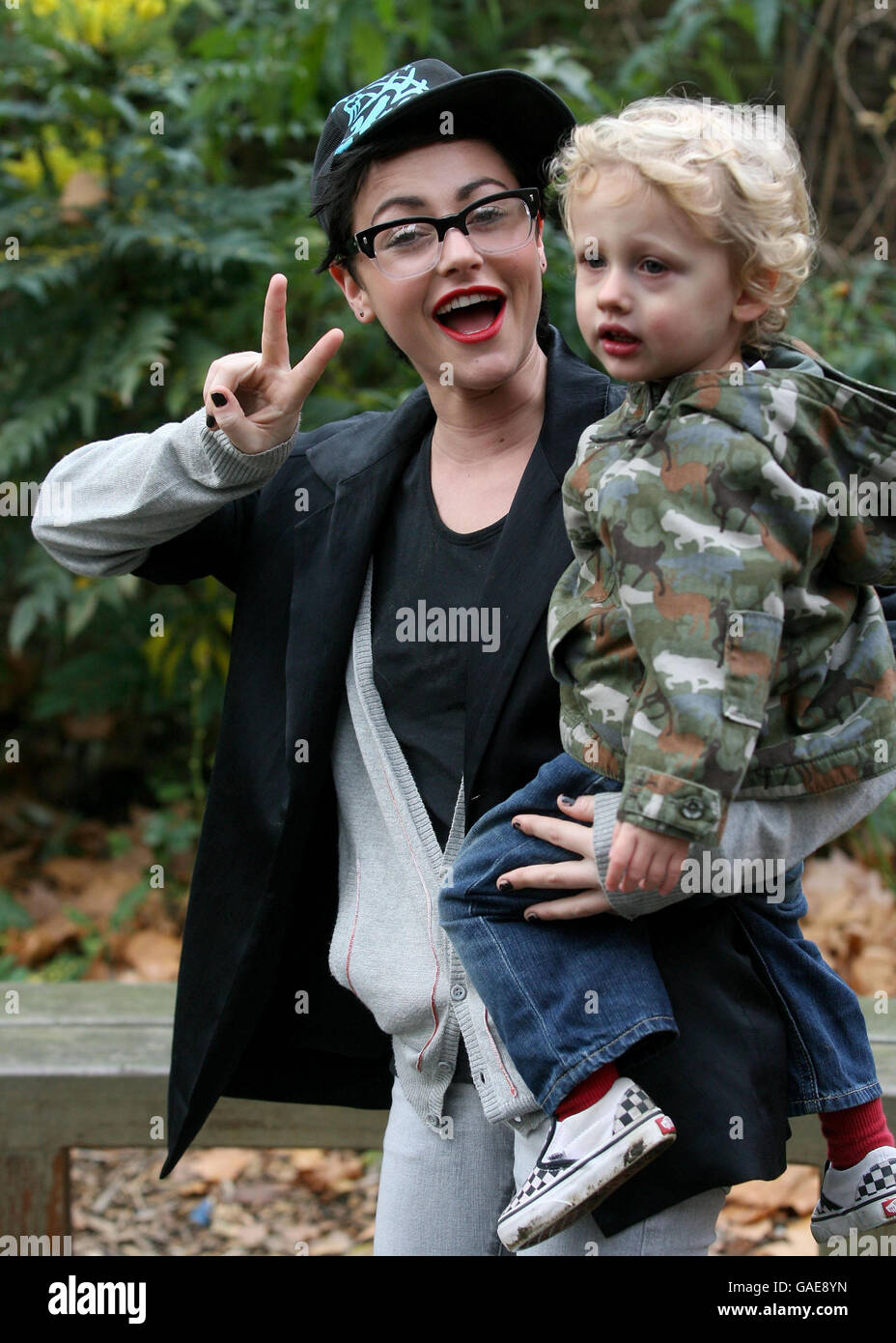 Jaime Winstone, star of A Twisted Carol, pose with an unidentified ...