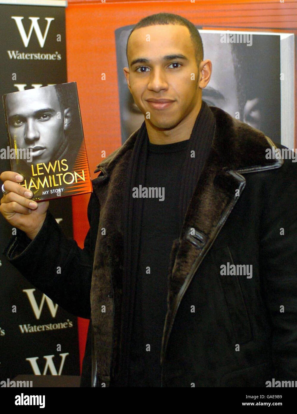 Racing driver Lewis Hamilton attends a book signing for his ...