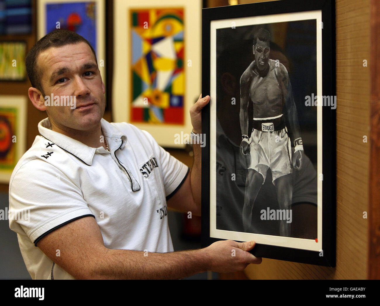 Prisoner Harry Murray,from Belfast,hangs his painting ''The Greatest ...