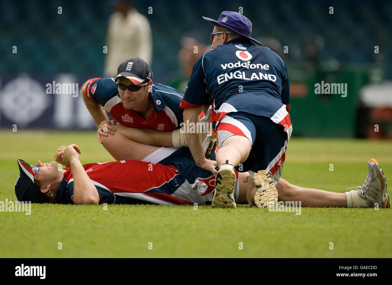 Sport cricket players stretching hi-res stock photography and images ...
