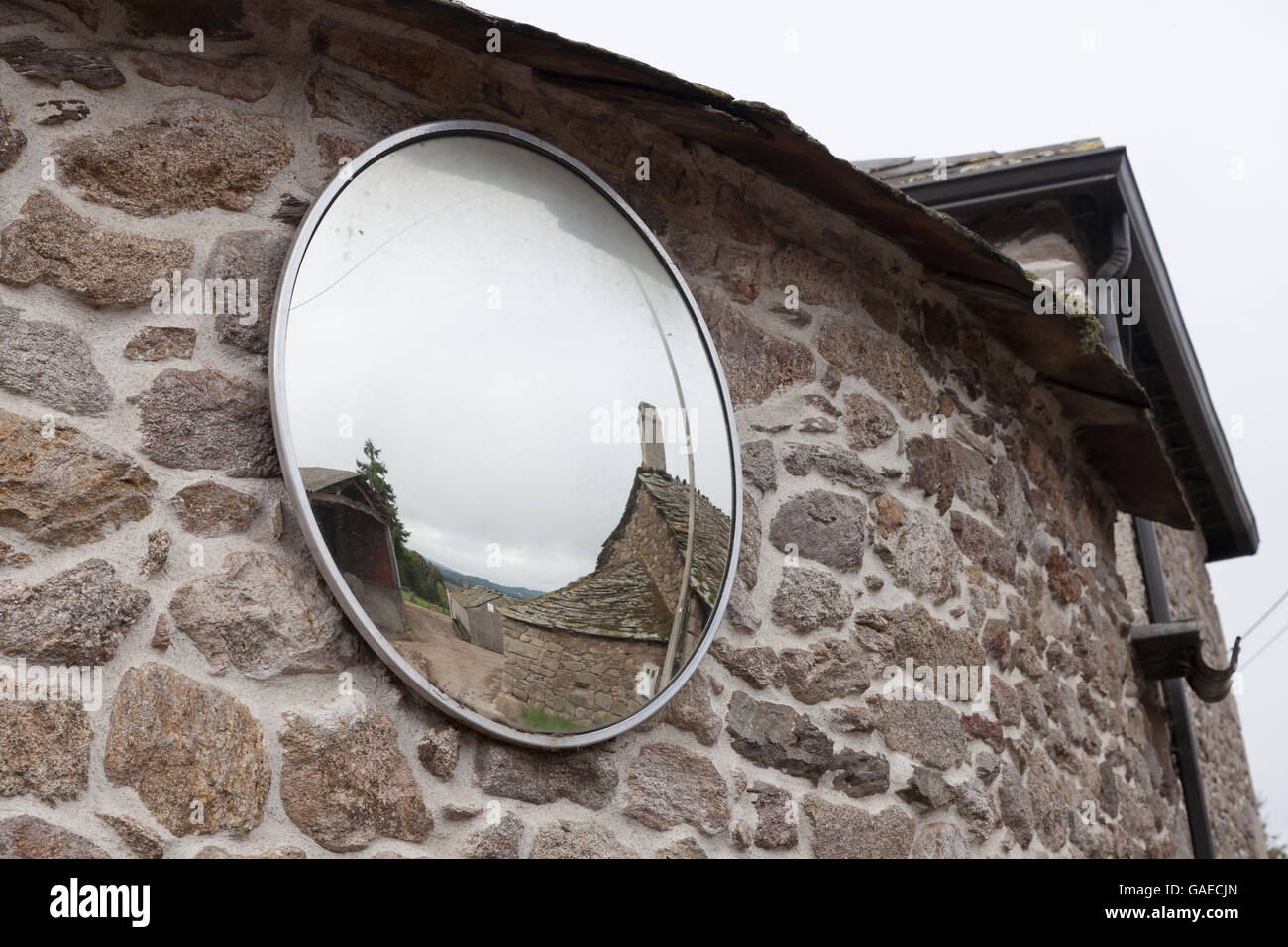 O Hospital, Spain: Convex traffic mirror at a narrow intersection in ...