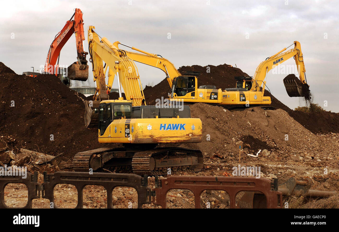 Olympic plans revealed. A trio of earthmovers work on the 2012 Olympic ...