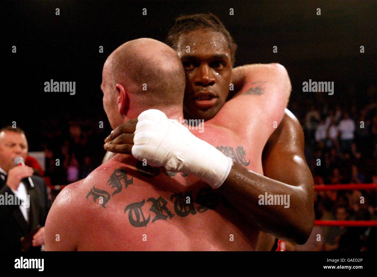 (R-L) Winner Audley Harrison and challenger Dominic Negus embrace after ...