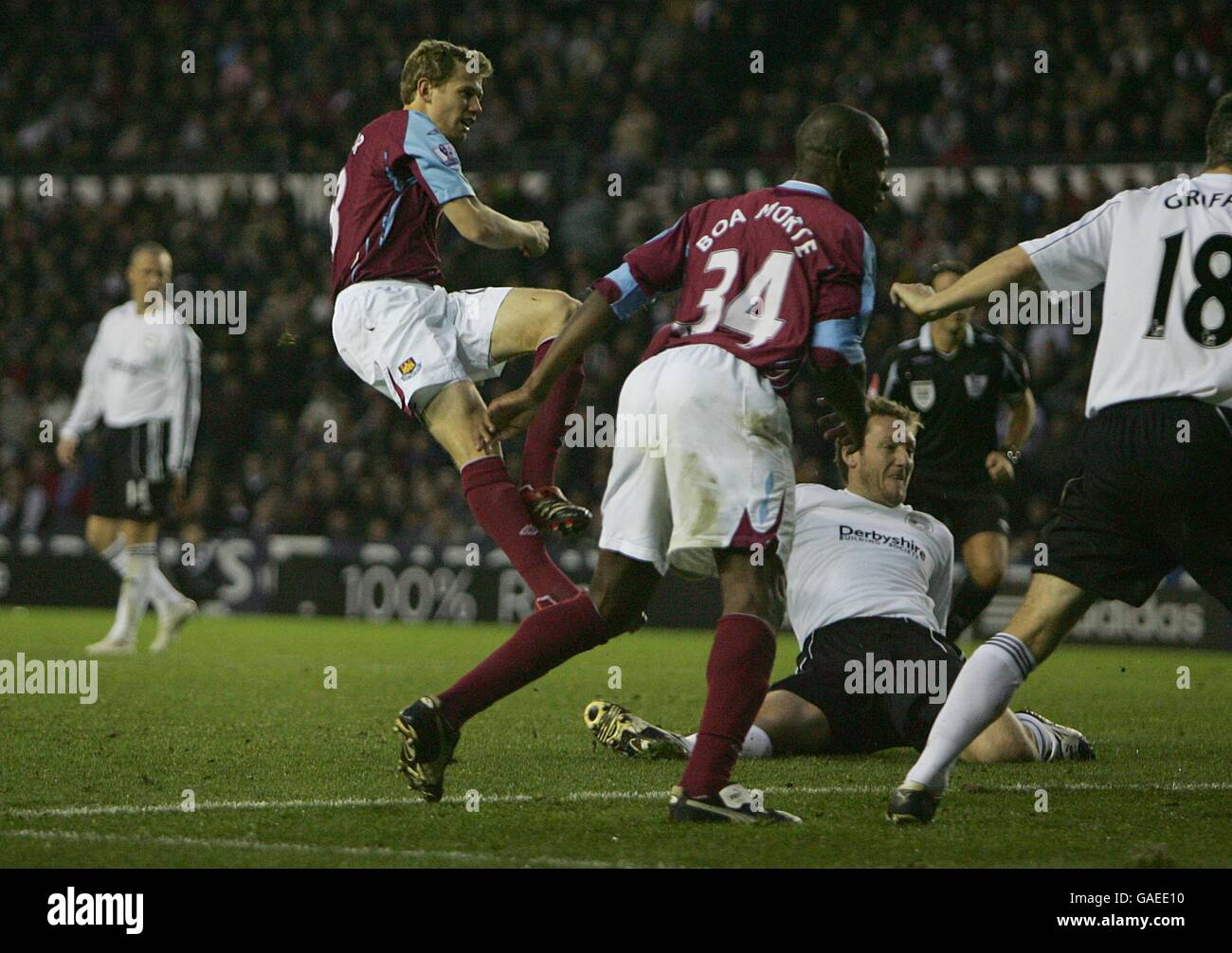 West Ham United's Jonathan Spector scores but is deflected of Derby ...