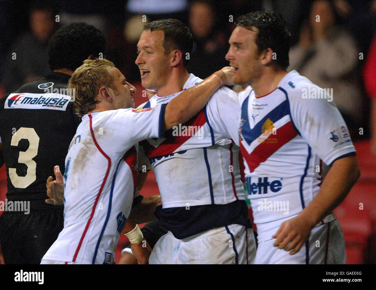 Great Britain's Danny McGuire (centre) celebrates his try with Rob ...