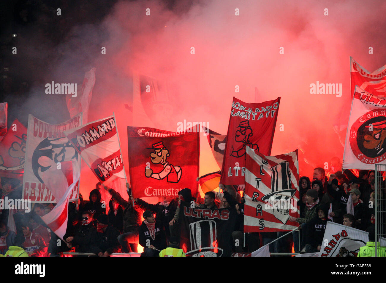 Vfb stuttgart fans stoke up the atmosphere in the stands hi-res stock ...