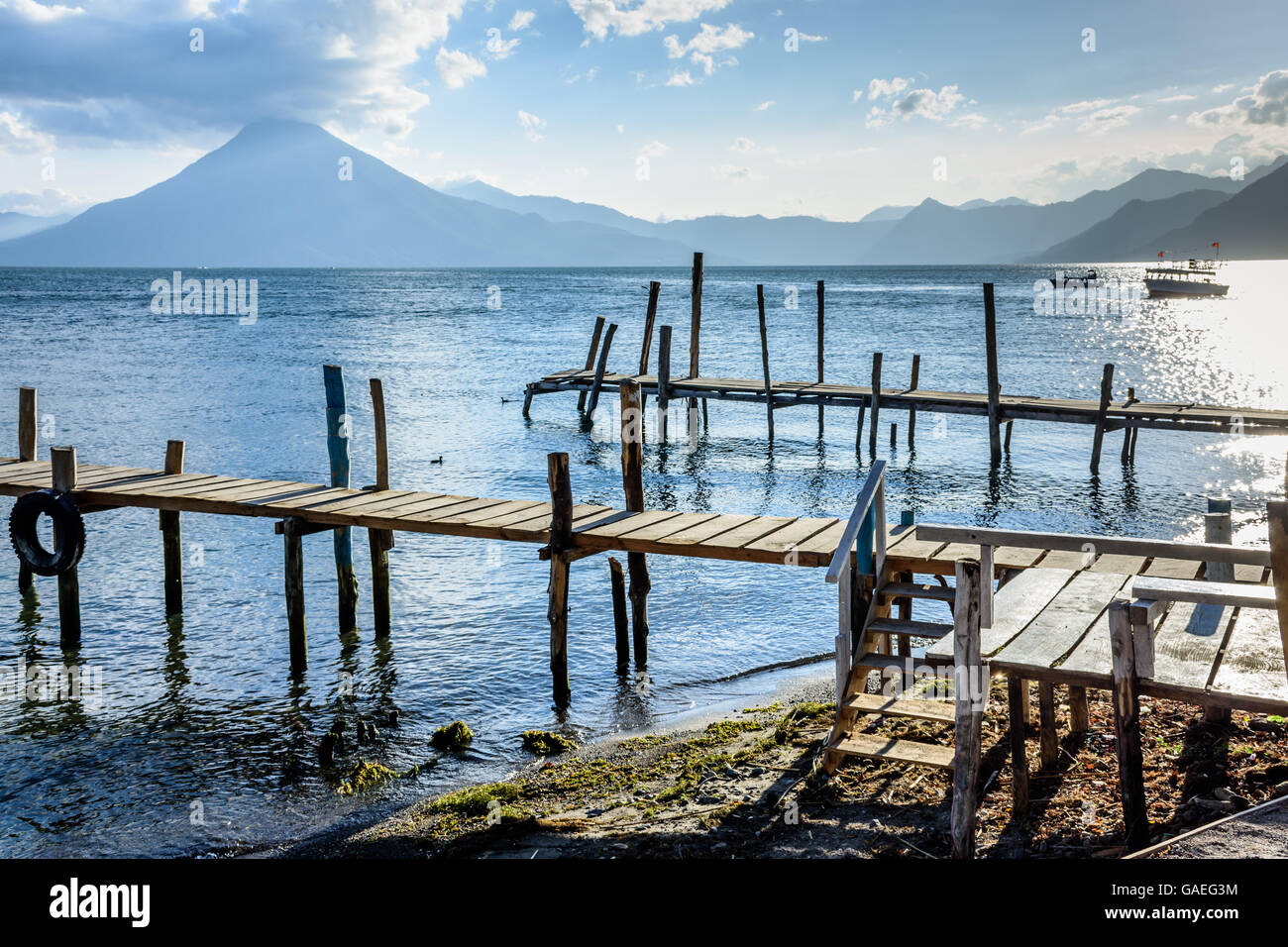 Evening light on Lake Atitlan with San Pedro volcano behind, Guatemala ...