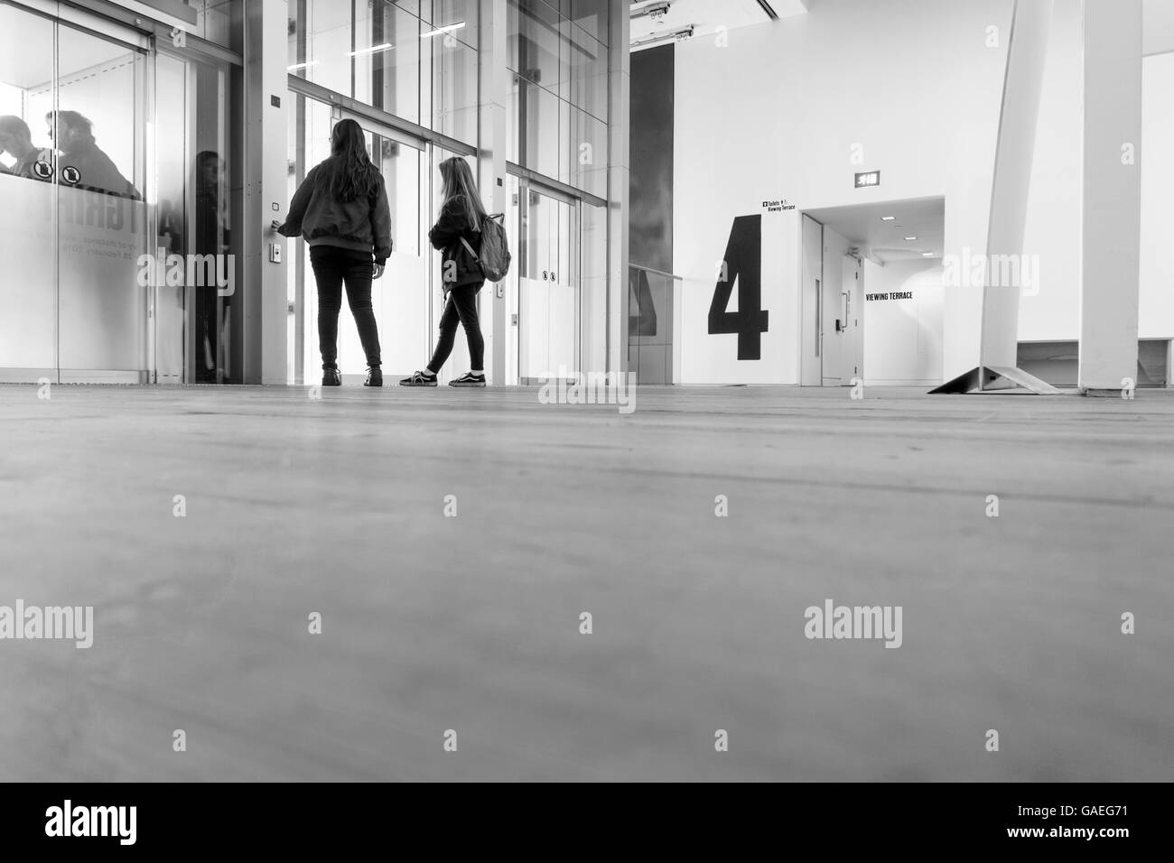 Waiting for lift Black and White Stock Photos & Images - Alamy