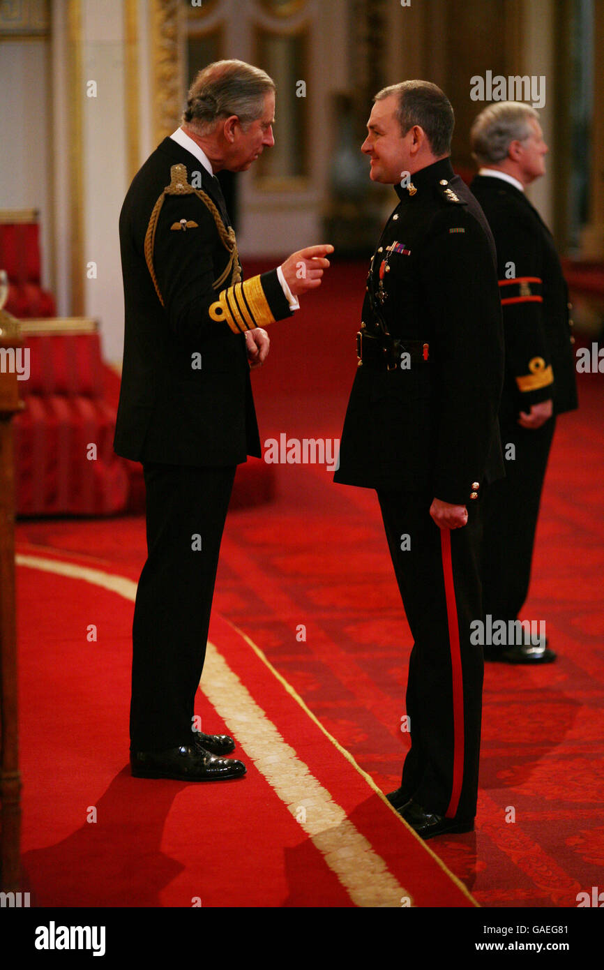 Captain Colin Smith is made an MBE by The Prince of Wales at Buckingham ...