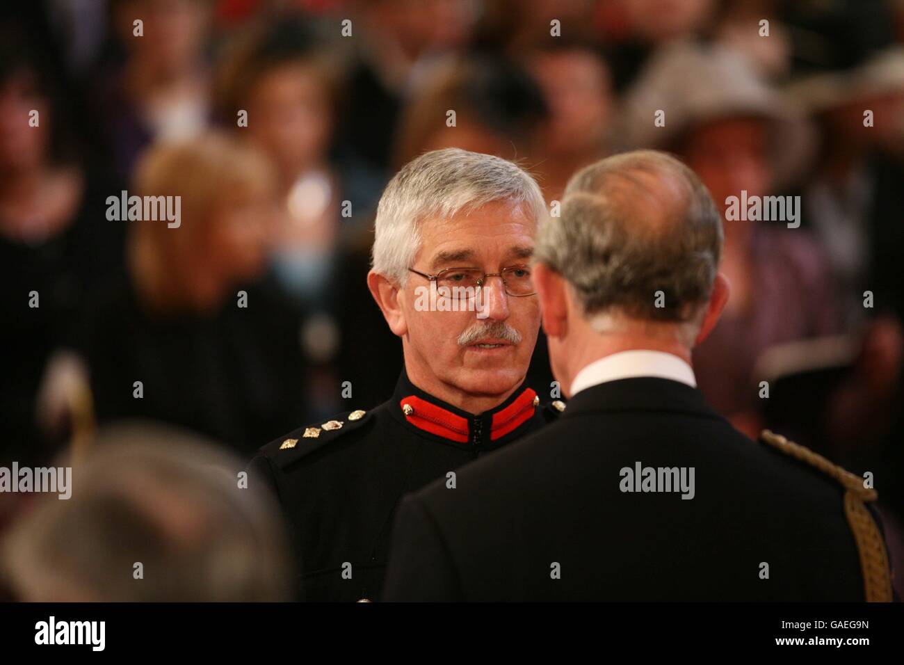 Colonel John Wilson is made an OBE by The Prince of Wales at Buckingham ...