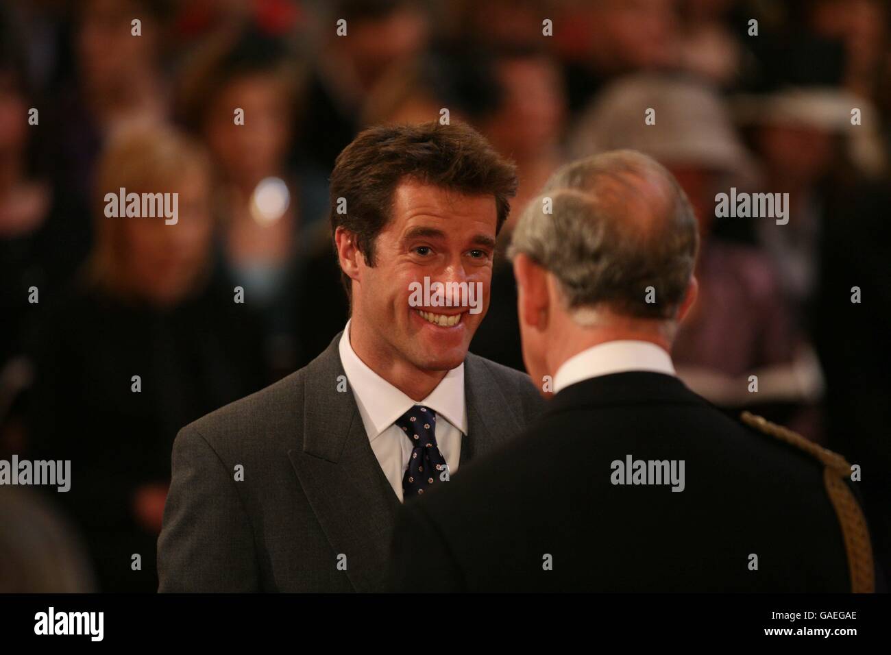 Mr. Roger Stringer is made an MBE by The Prince of Wales at Buckingham ...