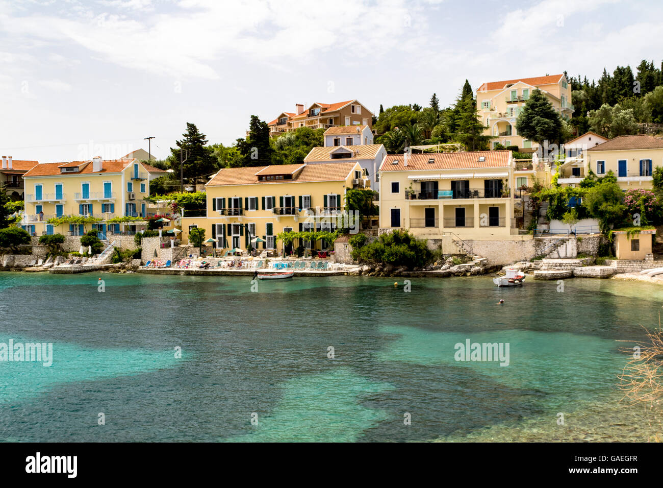 Waterside Houses, Boats and Terraces by Fiskardo Beach, Kefalonia ...