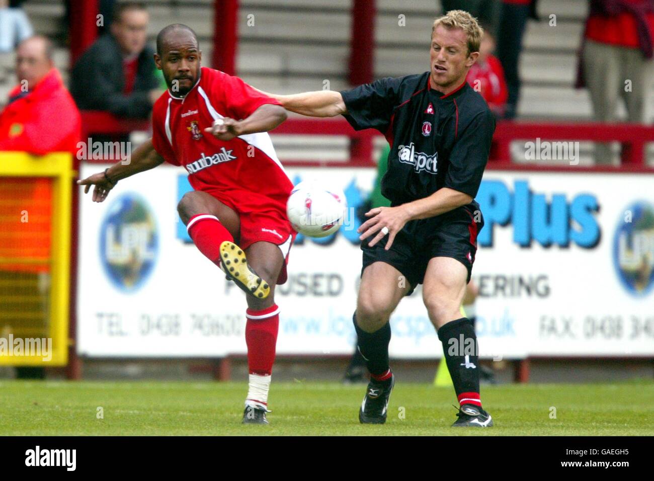 (L-R) Stevenage Borough's Jean Michele Sigere and Charlton's Gary ...