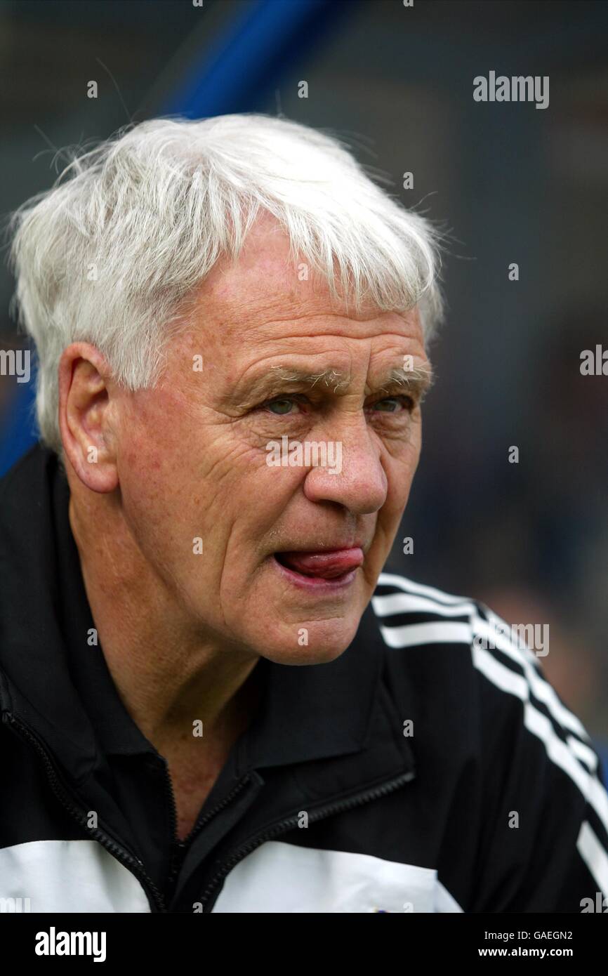 Newcastle United's Manager Sir Bobby Robson keeps an eye on the action ...