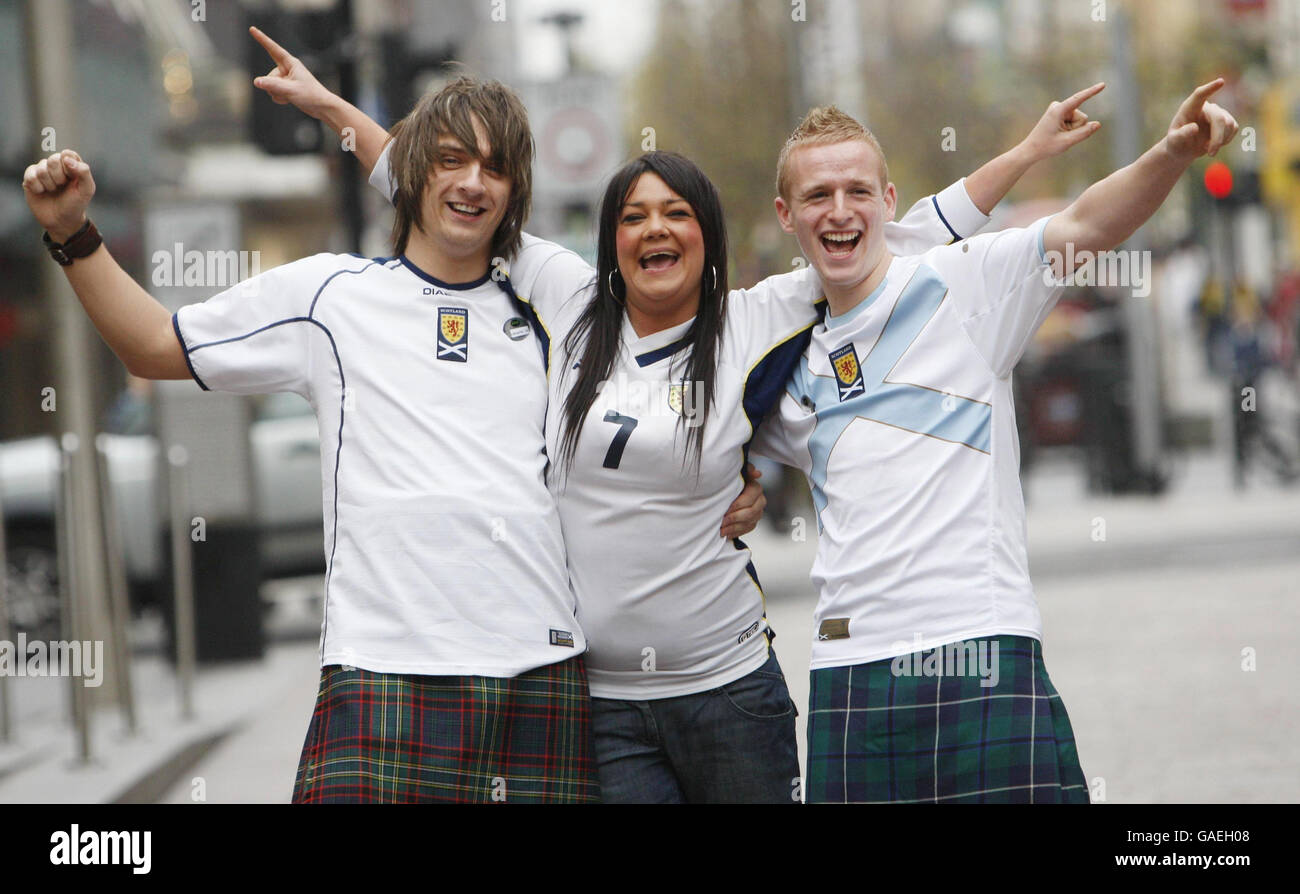 Scotland fans Graeme McLaughlin, 22, Rebecca Eyre, 25 and Laurie ...
