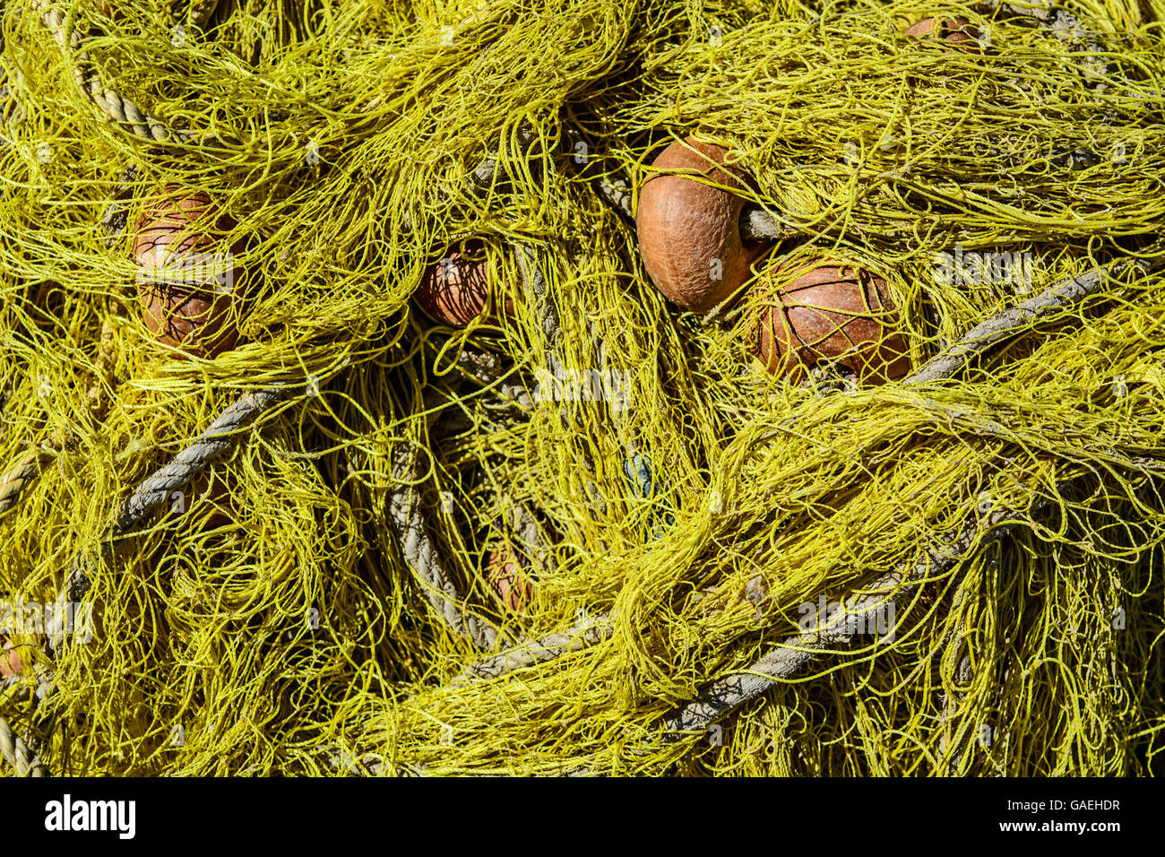 Sea drift net which dries in the summer sun Stock Photo - Alamy