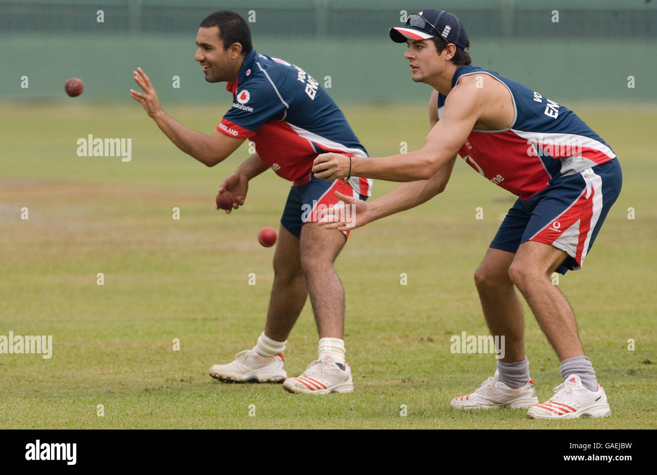 Full length action catching ball england mangrk hi-res stock ...