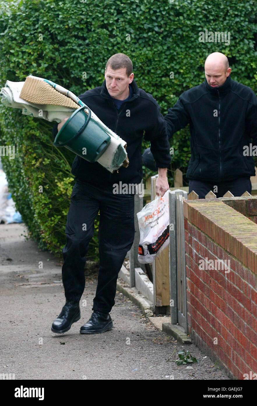 Search goes on at house after body discovery Stock Photo - Alamy