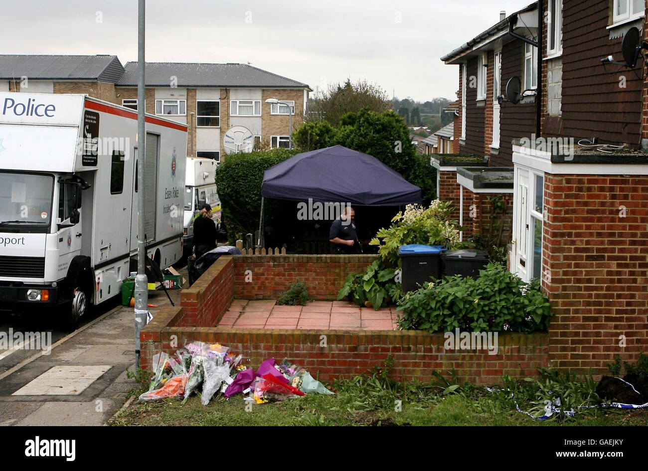 Search goes on at house after body discovery Stock Photo - Alamy