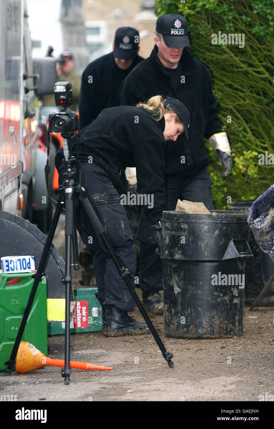 Search goes on at house after body discovery Stock Photo - Alamy