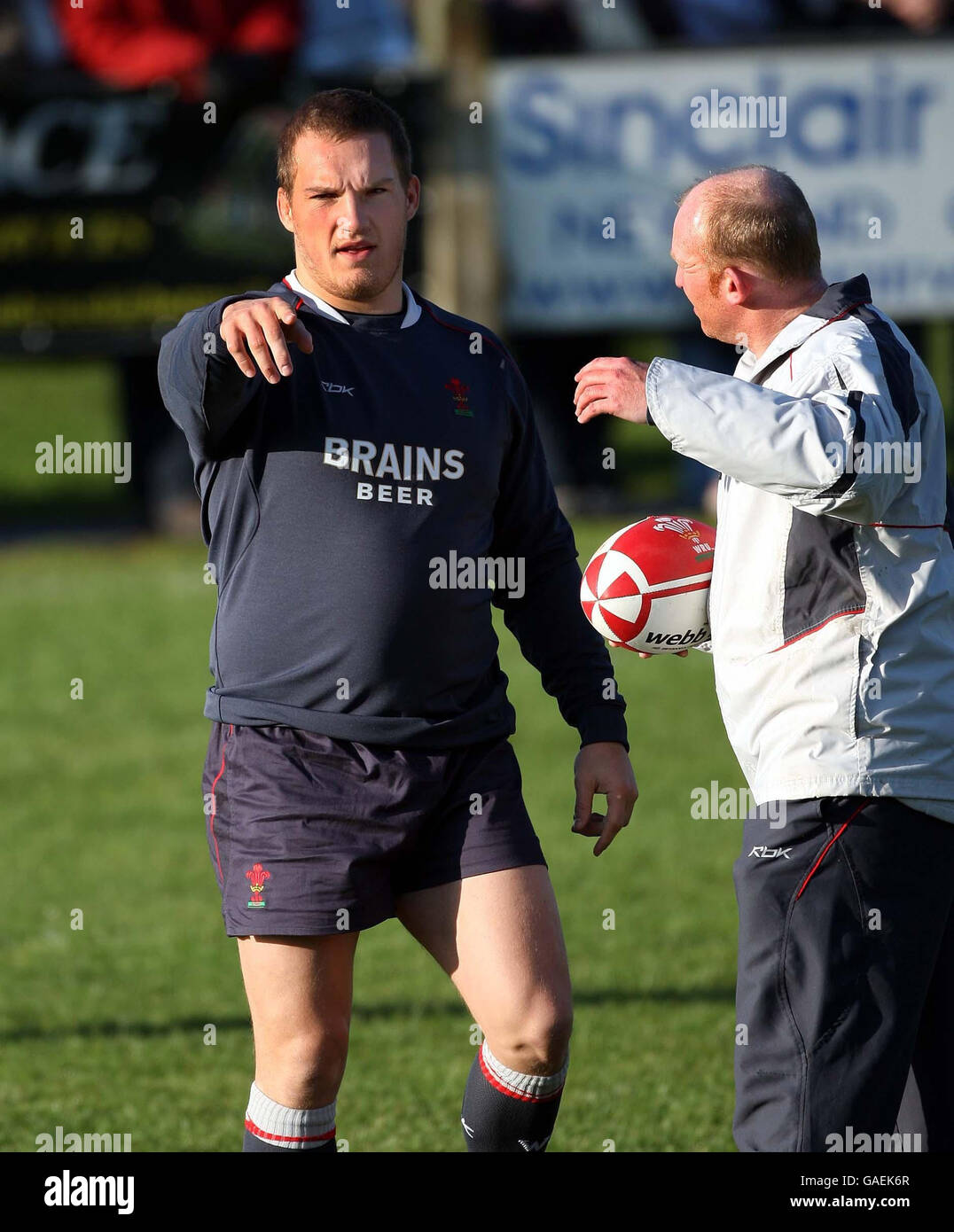 Wales' captain prop forward Gethin Jenkins talks to assistant coach ...