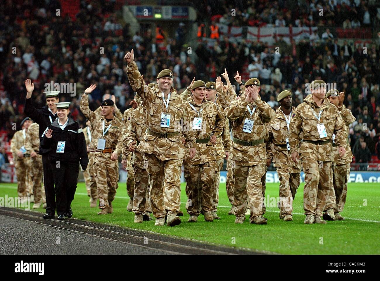 Forces foundation full length service men women and football hi-res ...