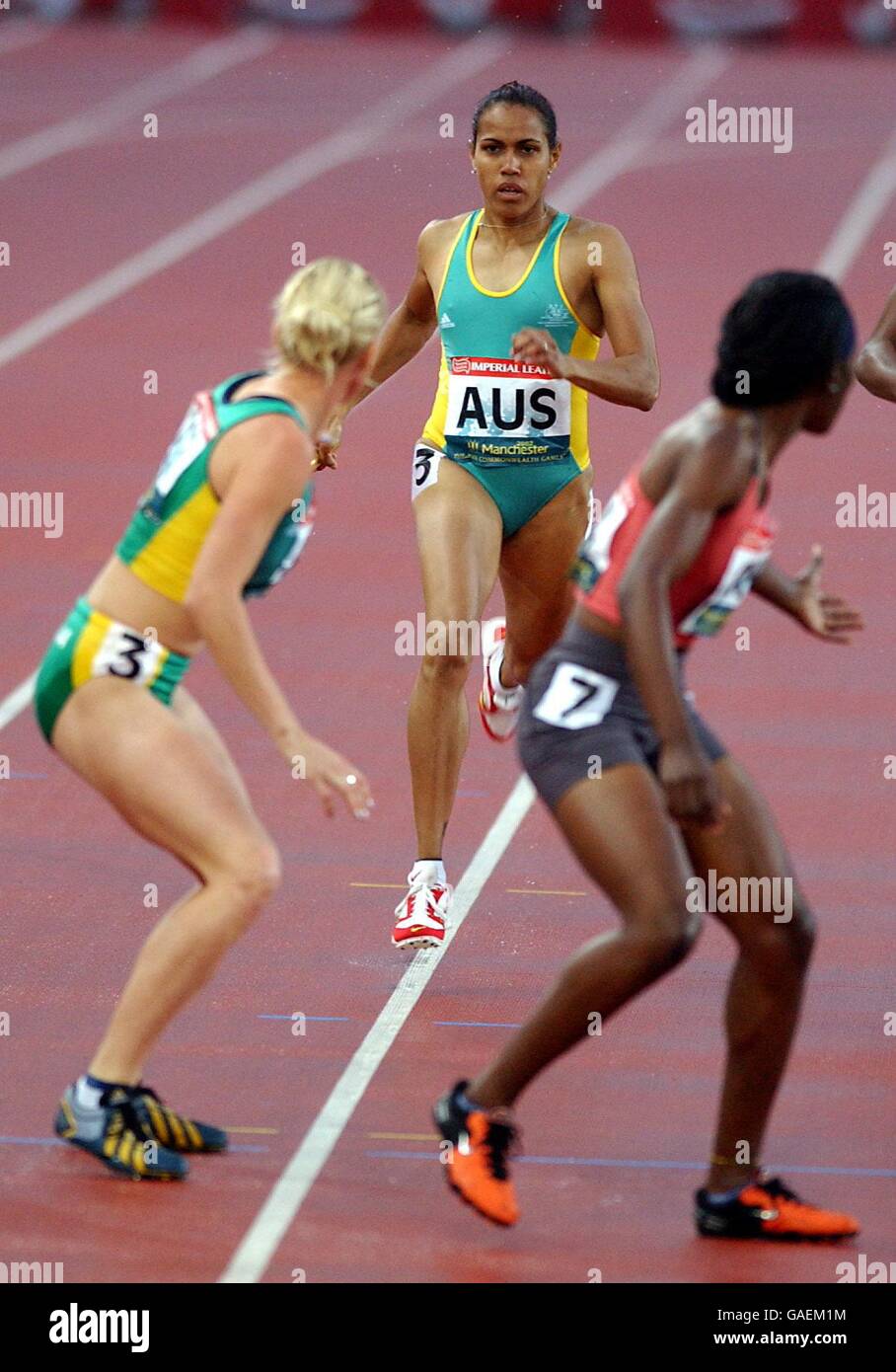 Australia's Cathy Freeman running the second leg of the 4x400m relay ...