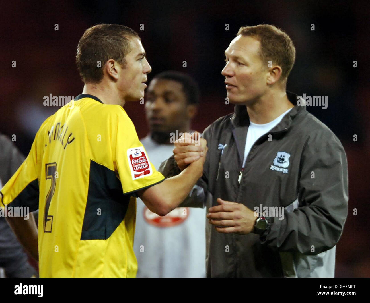 Plymouth Argyle's manager Tim Breacker (right) celebrate his team win ...