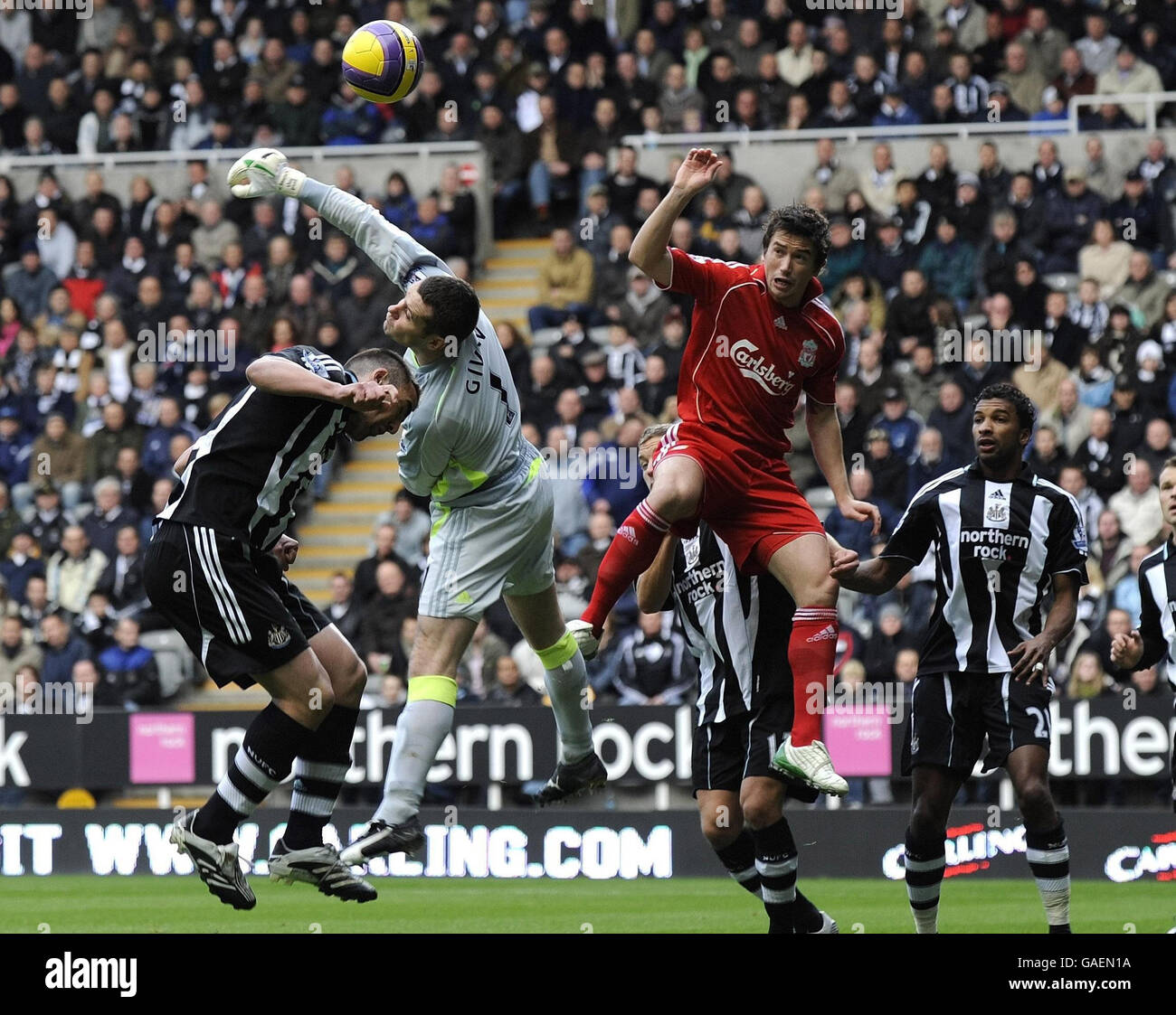 Liverpool's Harry Kewell puts pressure on Newcastle goalkeeper Shay ...