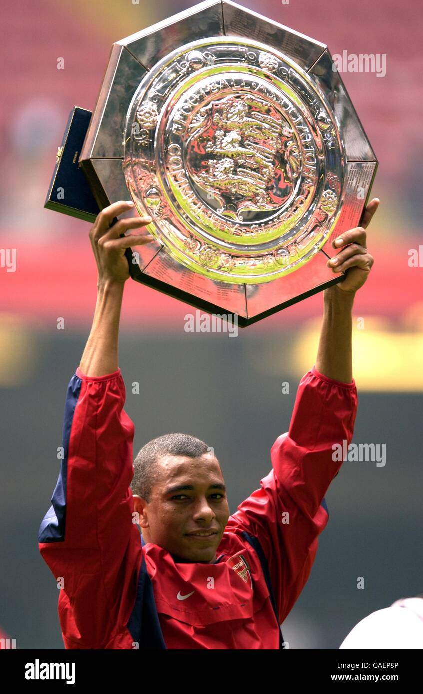 Arsenal's Gilberto Silva holds up the Community Shield Trophy Stock ...