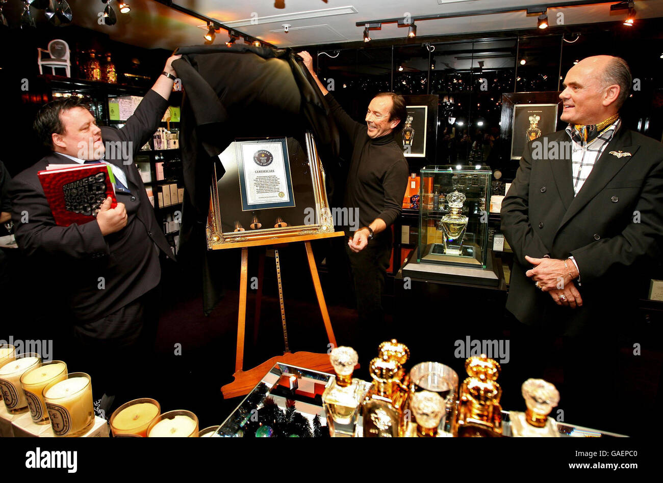 Clive Christian (centre) is awarded the Guinness World record for the ...