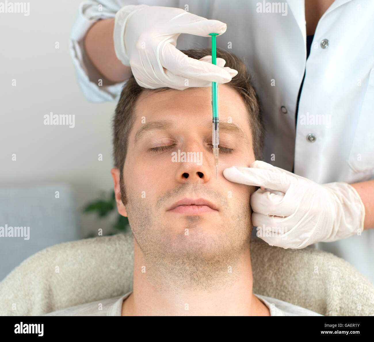 Handsome man is getting injection. Concept of aesthetic beauty Stock ...