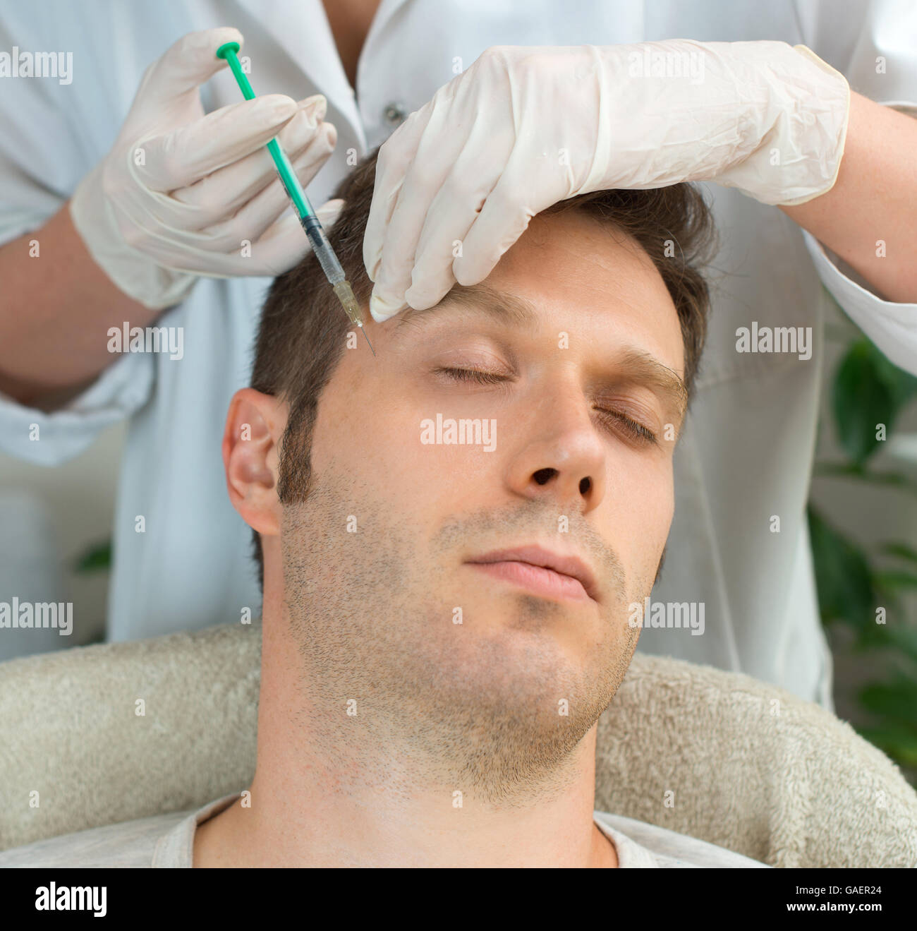 Handsome man is getting injection. Concept of aesthetic beauty Stock ...