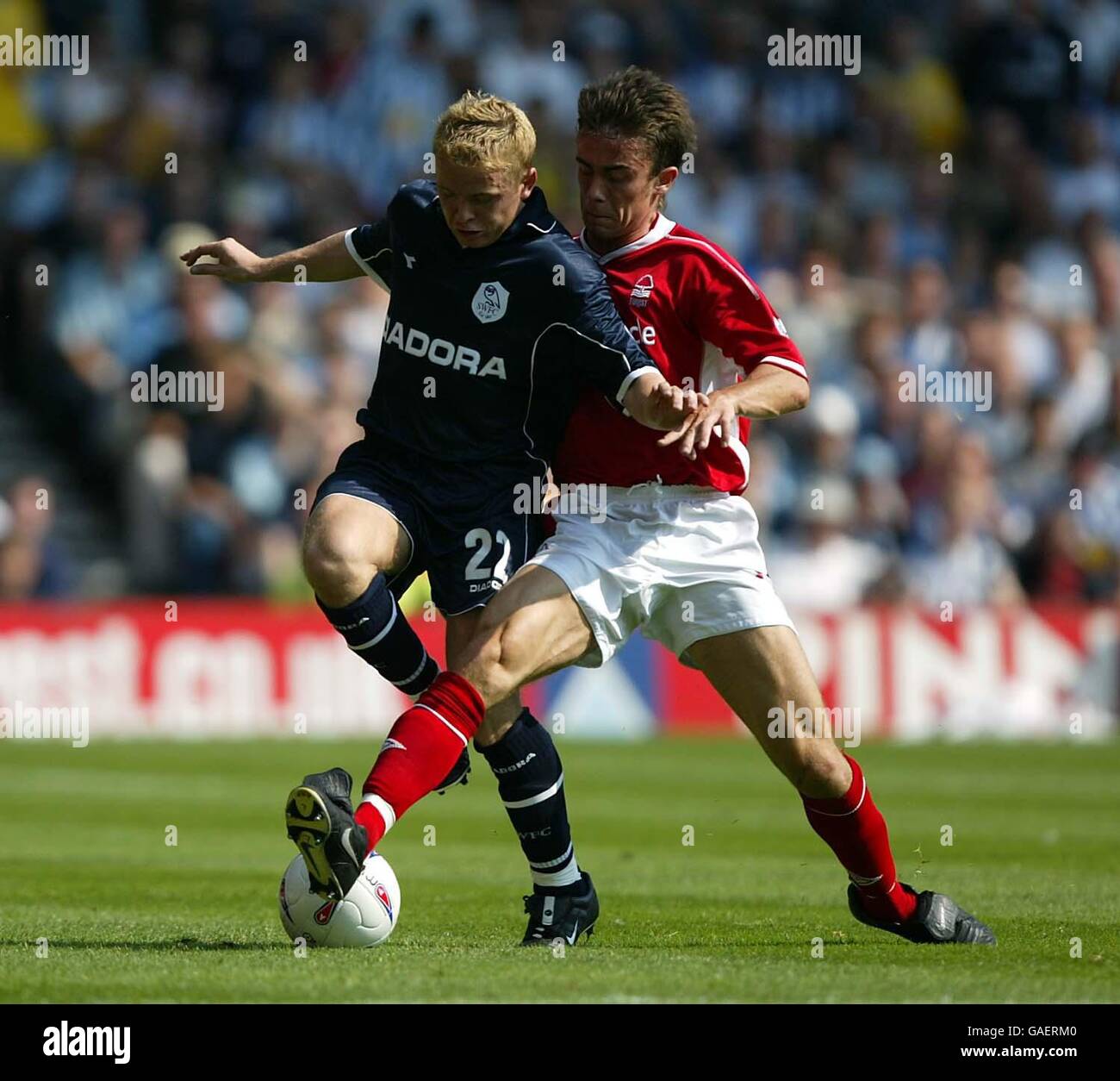 Nottingham Forest's David Prutton and Sheffield Wednesday's Derek Geary ...