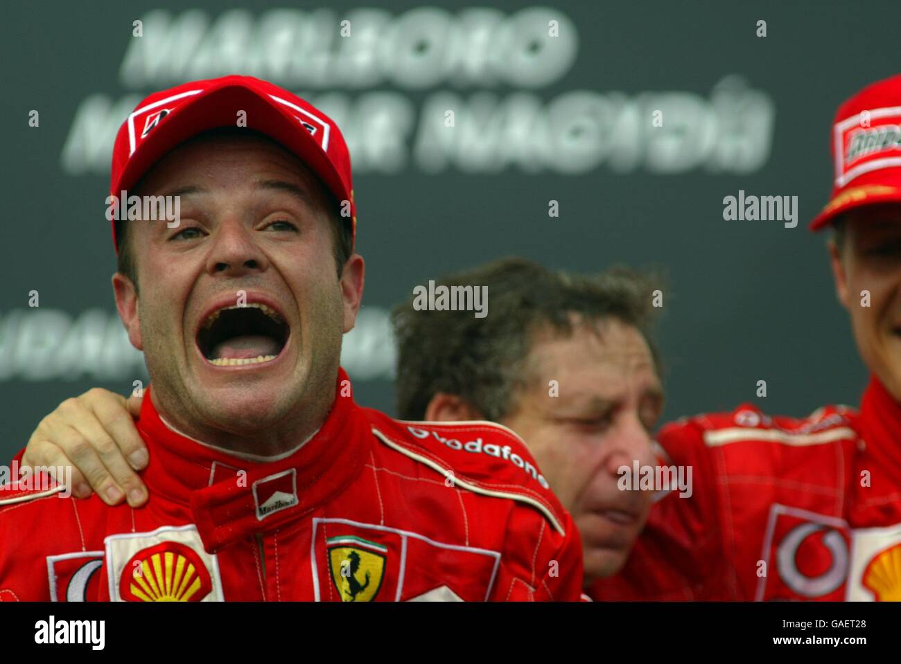 Ferrari's Rubens Barrichello shouts to the crowd in celebration of ...