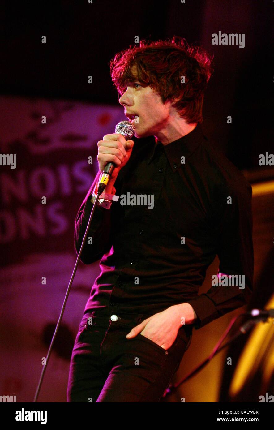 Joe Lean & The Jing Jang Jong performing on stage at the Union Chapel ...