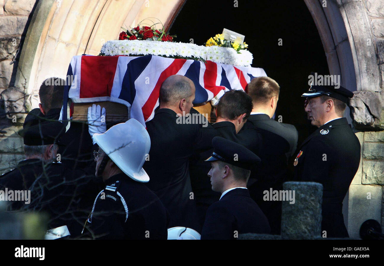 The coffin of Ian Reid is carried into St Gregory the Great Catholic ...