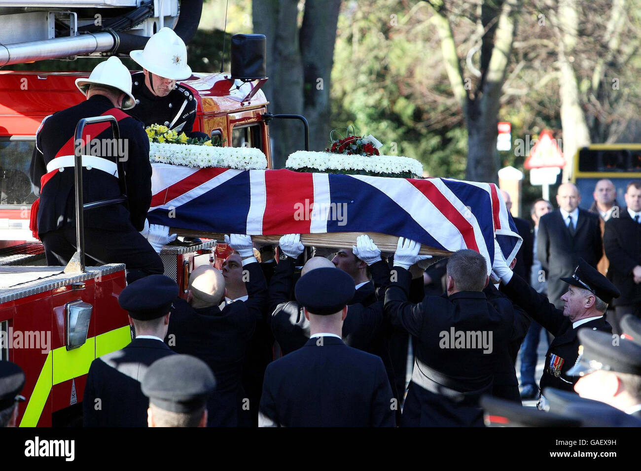 The coffin of Ian Reid arrives at St Gregory the Great Catholic Church ...