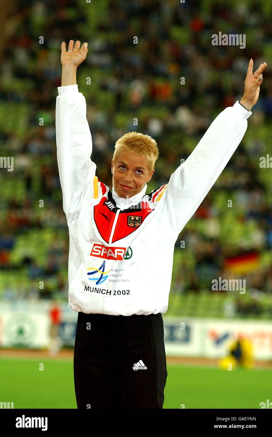 Germany's Grit Breuer celebrates winning the silver medal Stock Photo ...