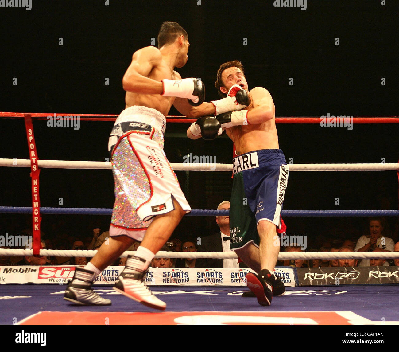 Amir Khan knocks down Graham Earl with left hand to the chin in the ...