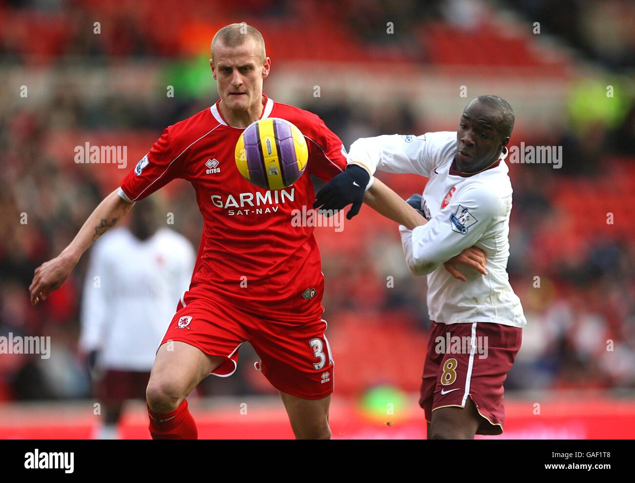 Middlesbrough's David Wheater (l) and Arsenal's Lassana Diarra battle ...