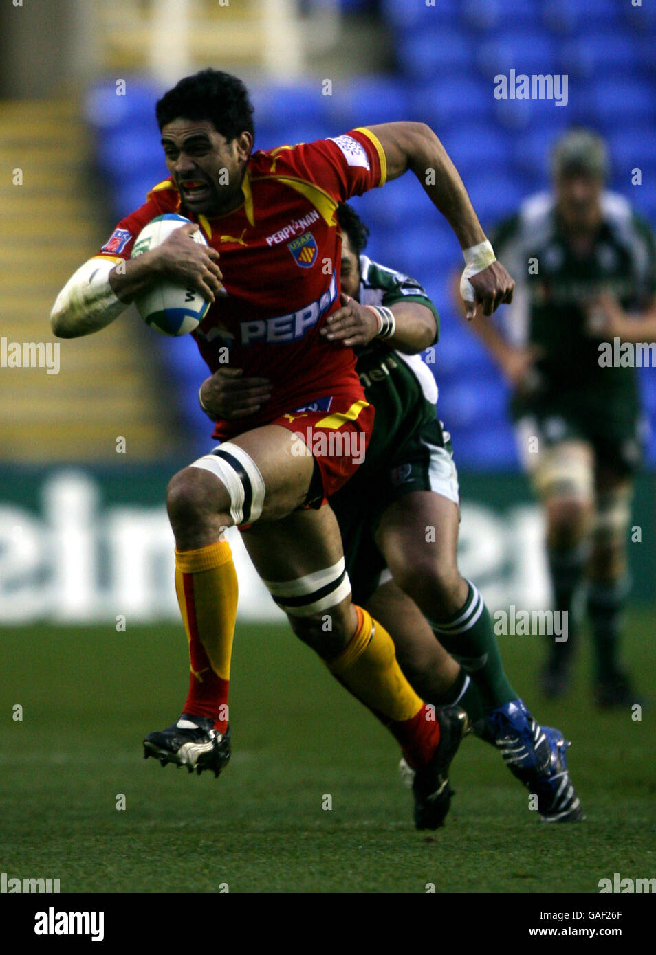 London Irish's Seilala Mapusua tackles Perpignan's Rimas Alvarez ...
