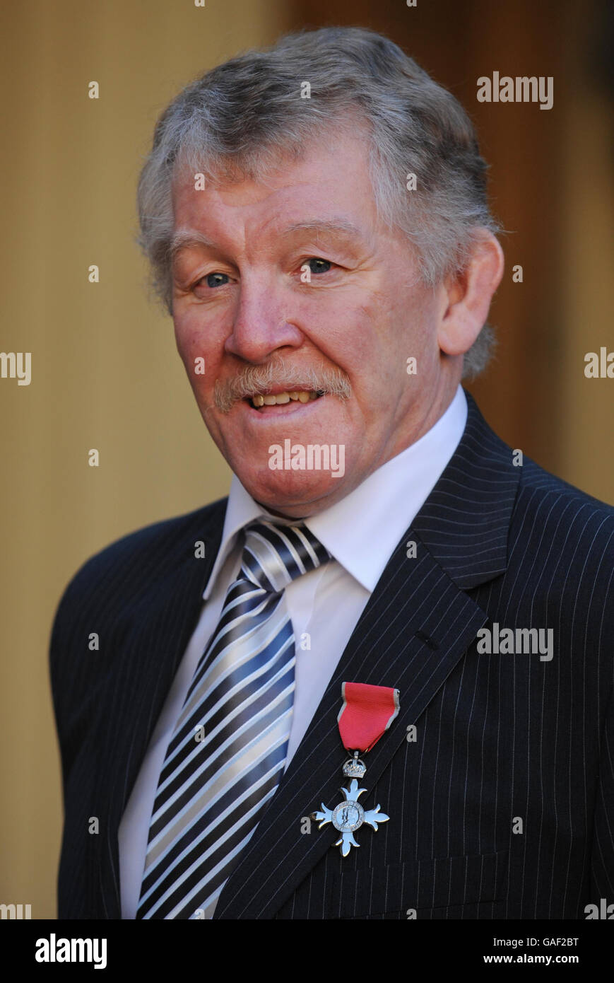 Welsh rugby great Graham Price after receiving an MBE from Britain's ...