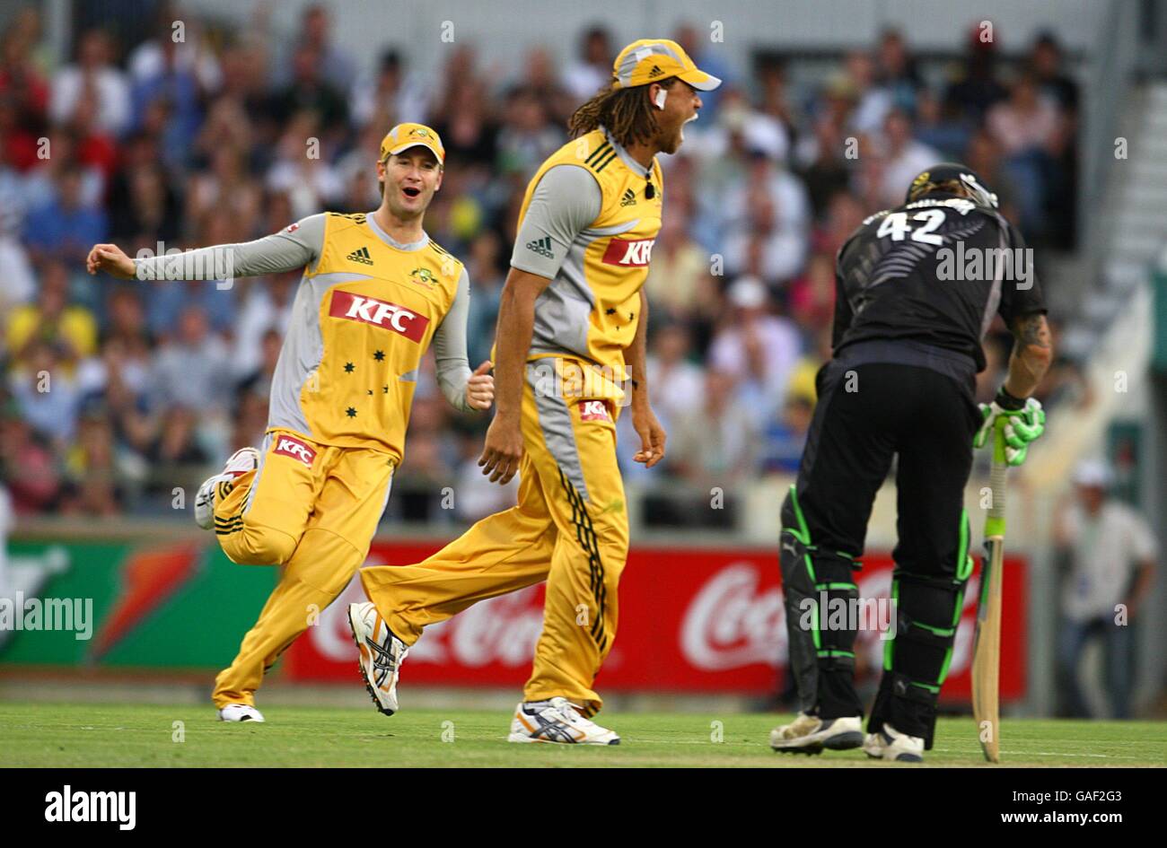 Australia's Andrew Symonds (centre) celebrates after Brett Lee claims ...